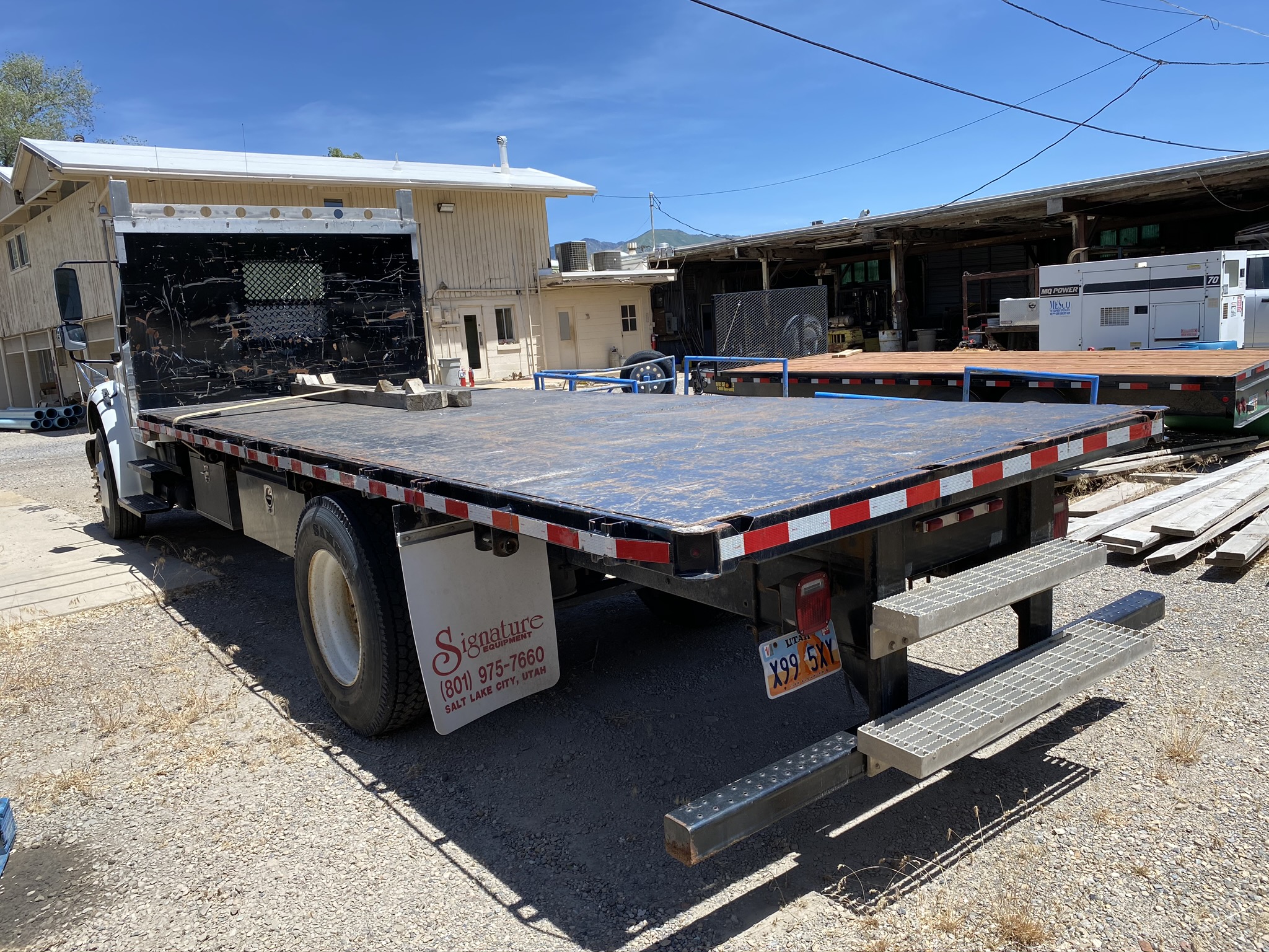 BUSINESS CLASS M2 FLAT BED TRUCK - Dogface Heavy Equipment Sales