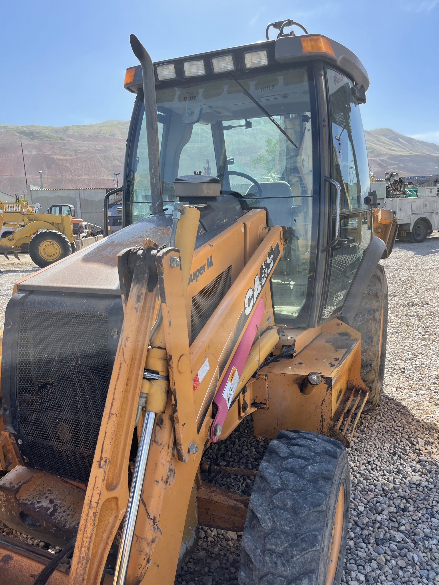 580 SUPER M 4X4 BACKHOE - Dogface Heavy Equipment Sales