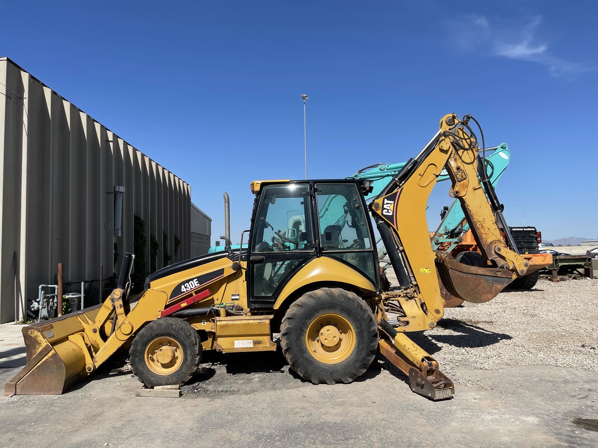 430E 4X4 BACKHOE - Dogface Heavy Equipment Sales