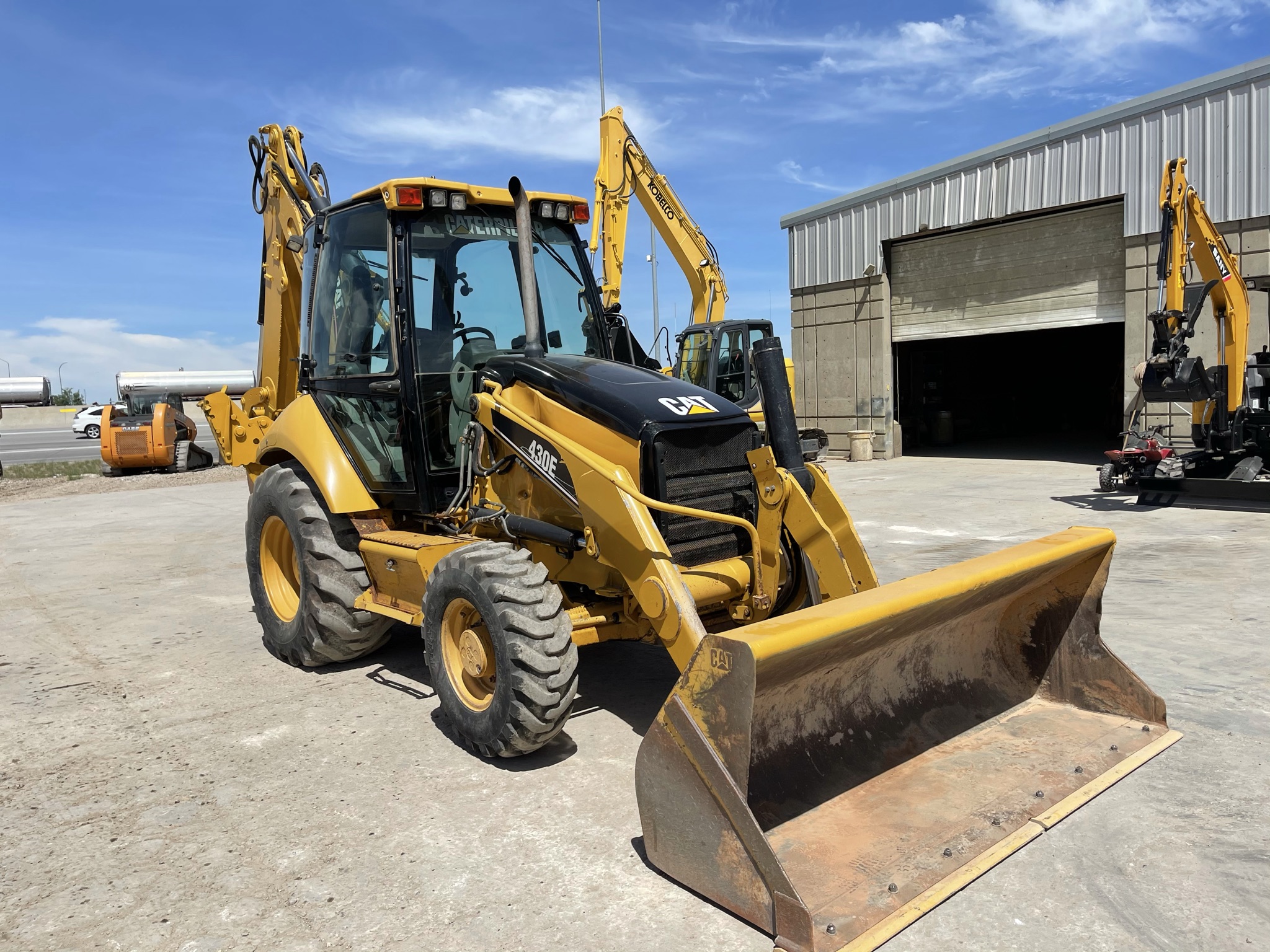430E 4X4 BACKHOE - Dogface Heavy Equipment Sales